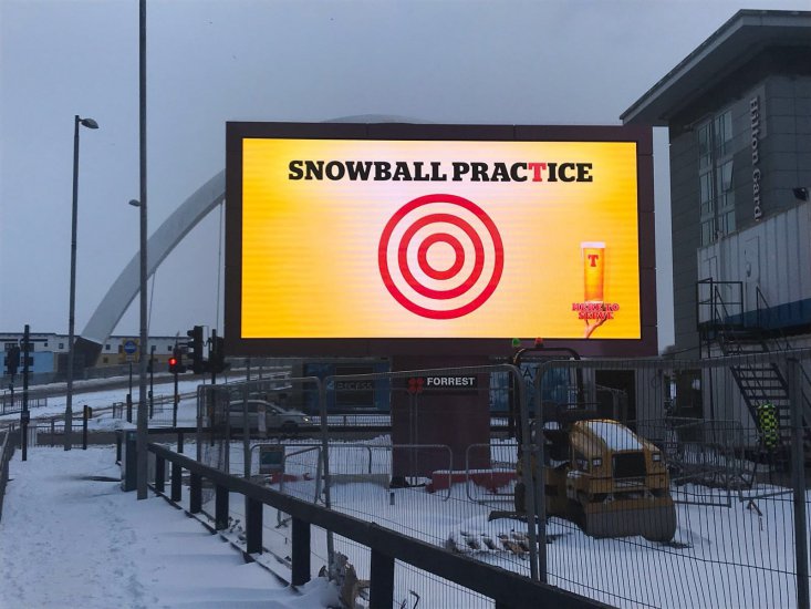 Tennent’s transform billboard into giant snowball target | Famous Campaigns