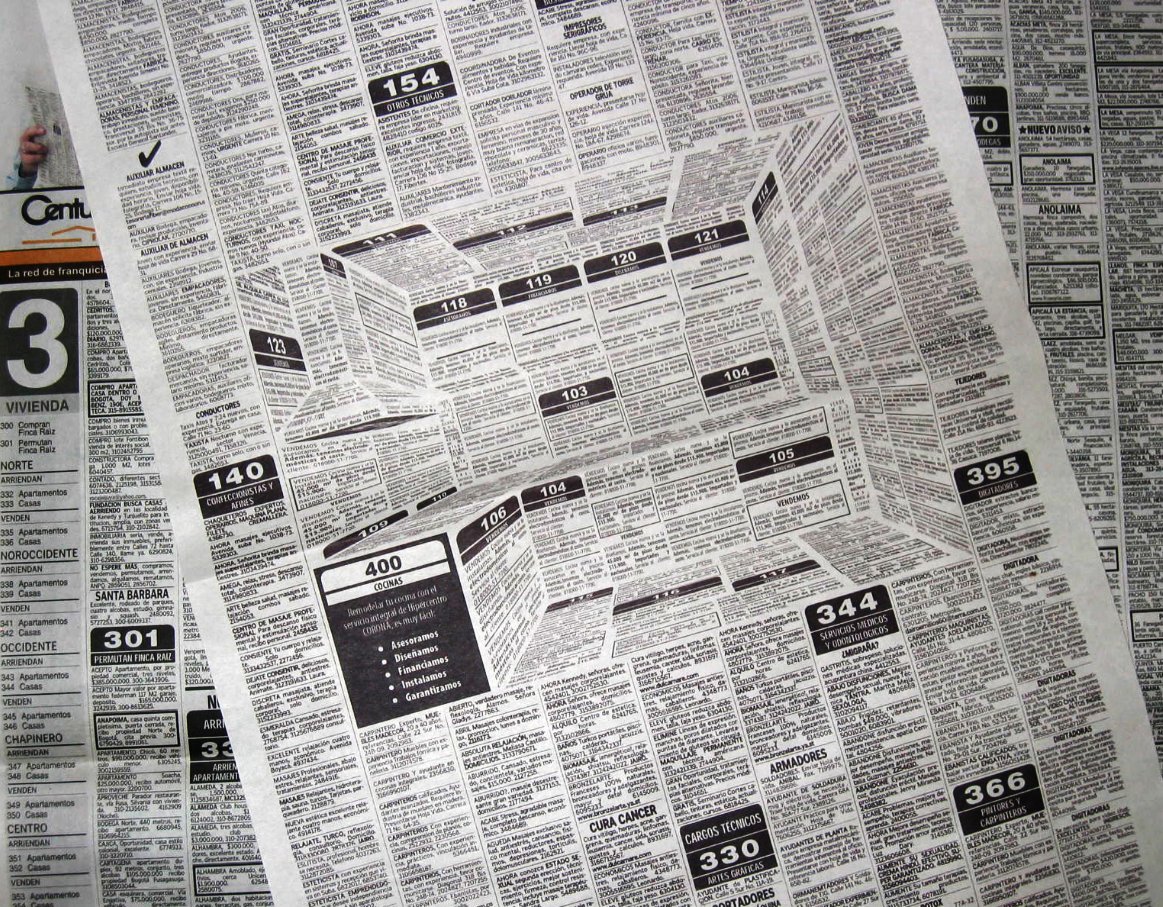 Kitchen adverts camouflaged in the classified ads of a local newspaper ...