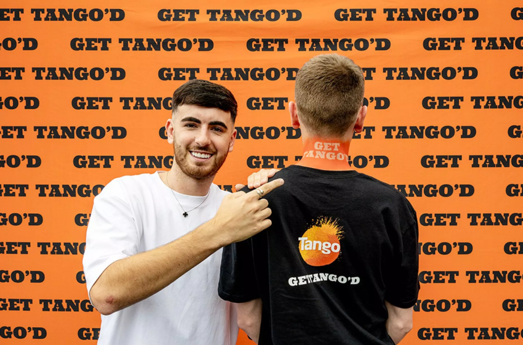 Tango spray paints Londoners orange in exchange for free Majorca ...