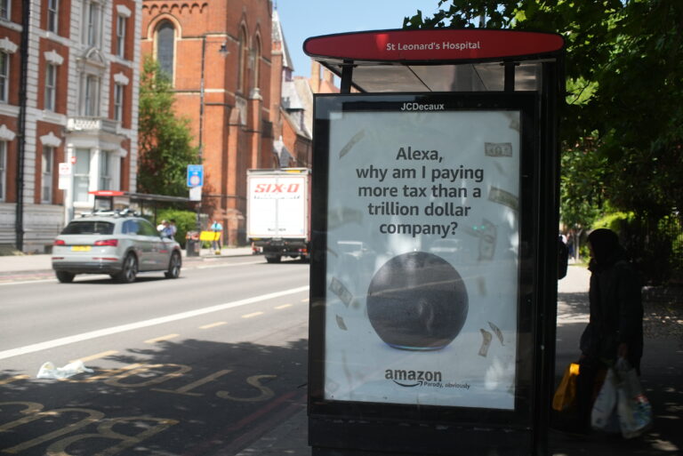 VIDEO: Activists target tax avoidance in the guise of Amazon Alexa ads ...